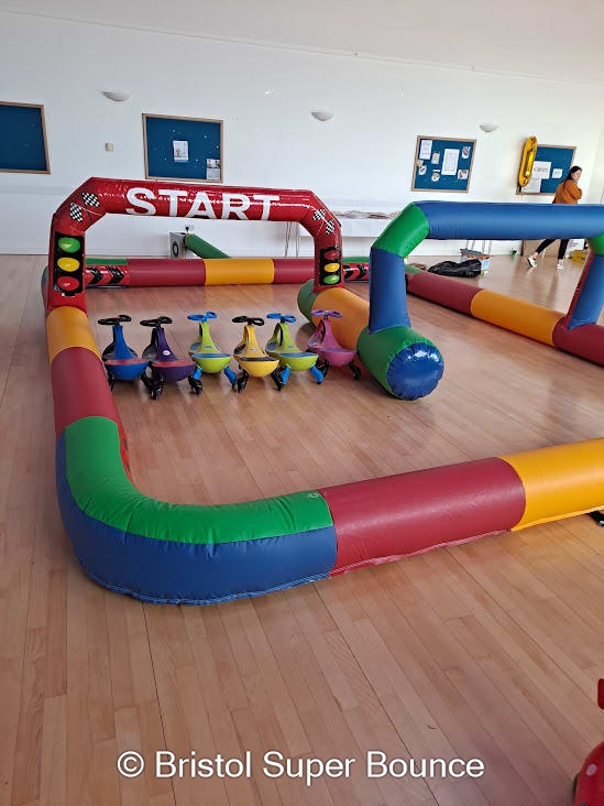 Didi car race track no 2 with 5x cars 18x20ft - Bouncy Castle Hire in ...